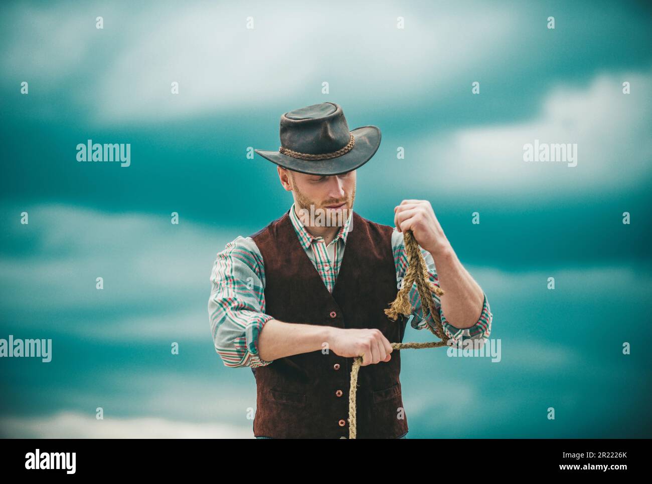 Guy cowboy. Owner of ranch. Farm worker and farming concept. Handsome ...