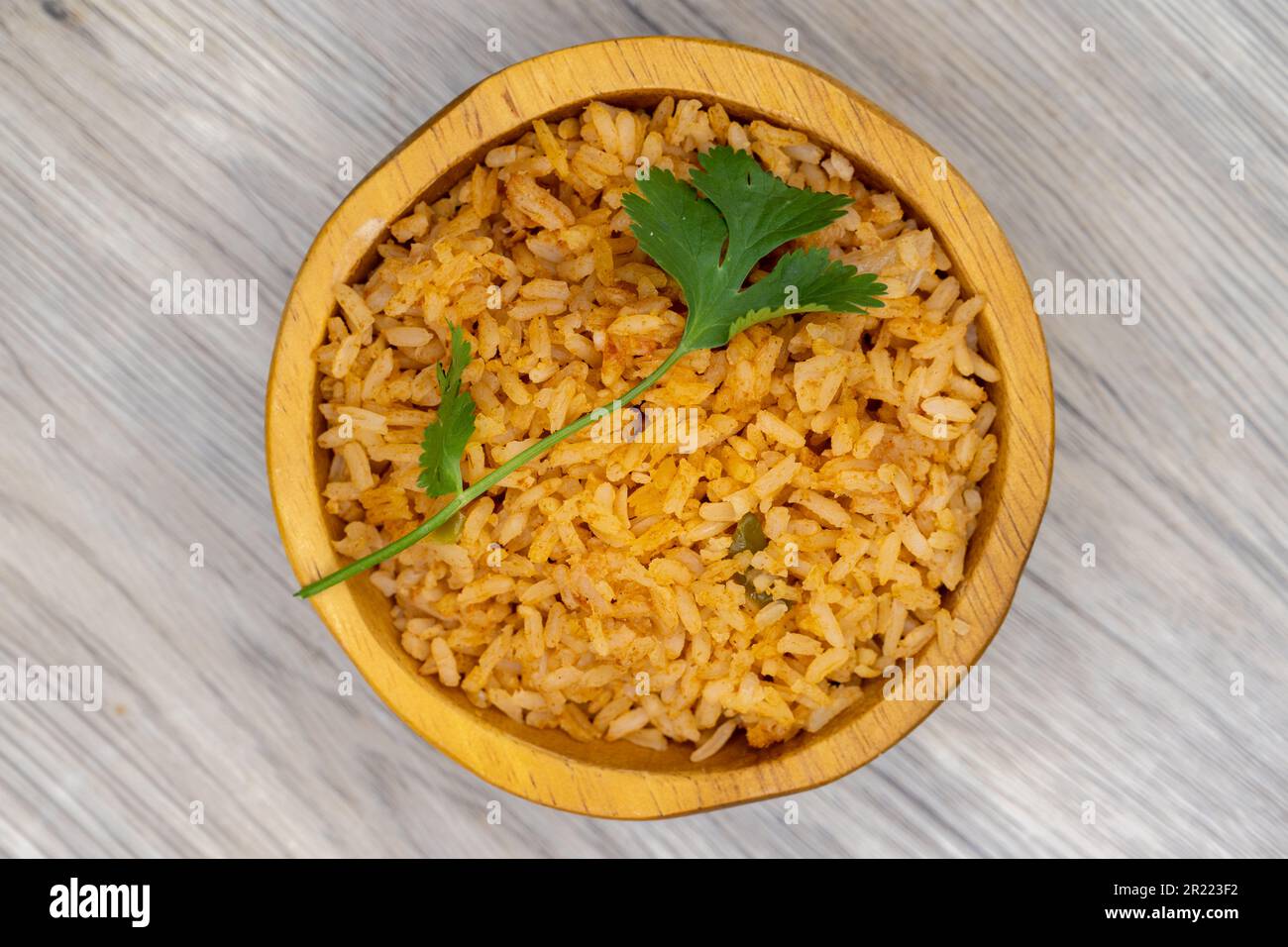 Overhead view of side order of Mexican rice with cilantro on top and ...