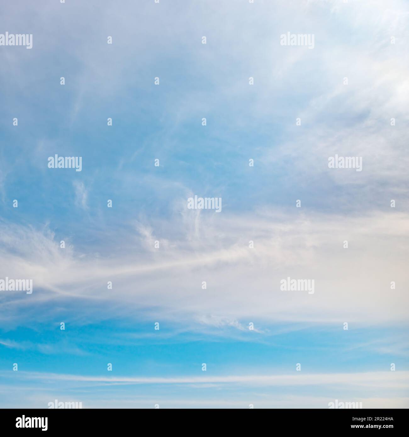 Beautiful white clouds on bright blue sky background Stock Photo - Alamy