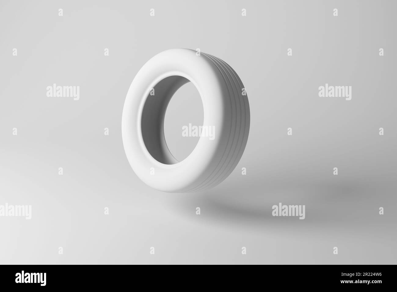 White tyre (US: tire) on white background showing monochrome design ...