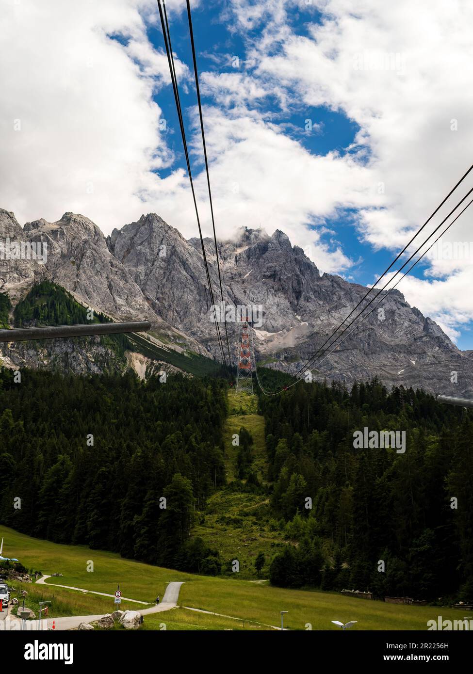 Zugspitze cable car track going up the summit as seen from the Eibsee ...