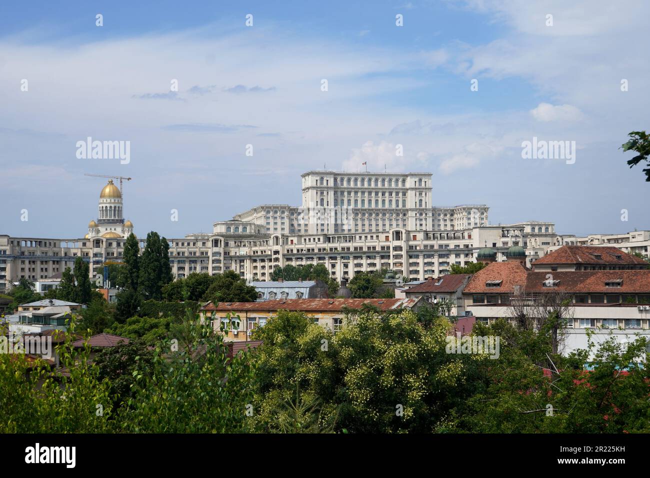 Cityscape in Bucharest with Palace of Parliament and under construction ...