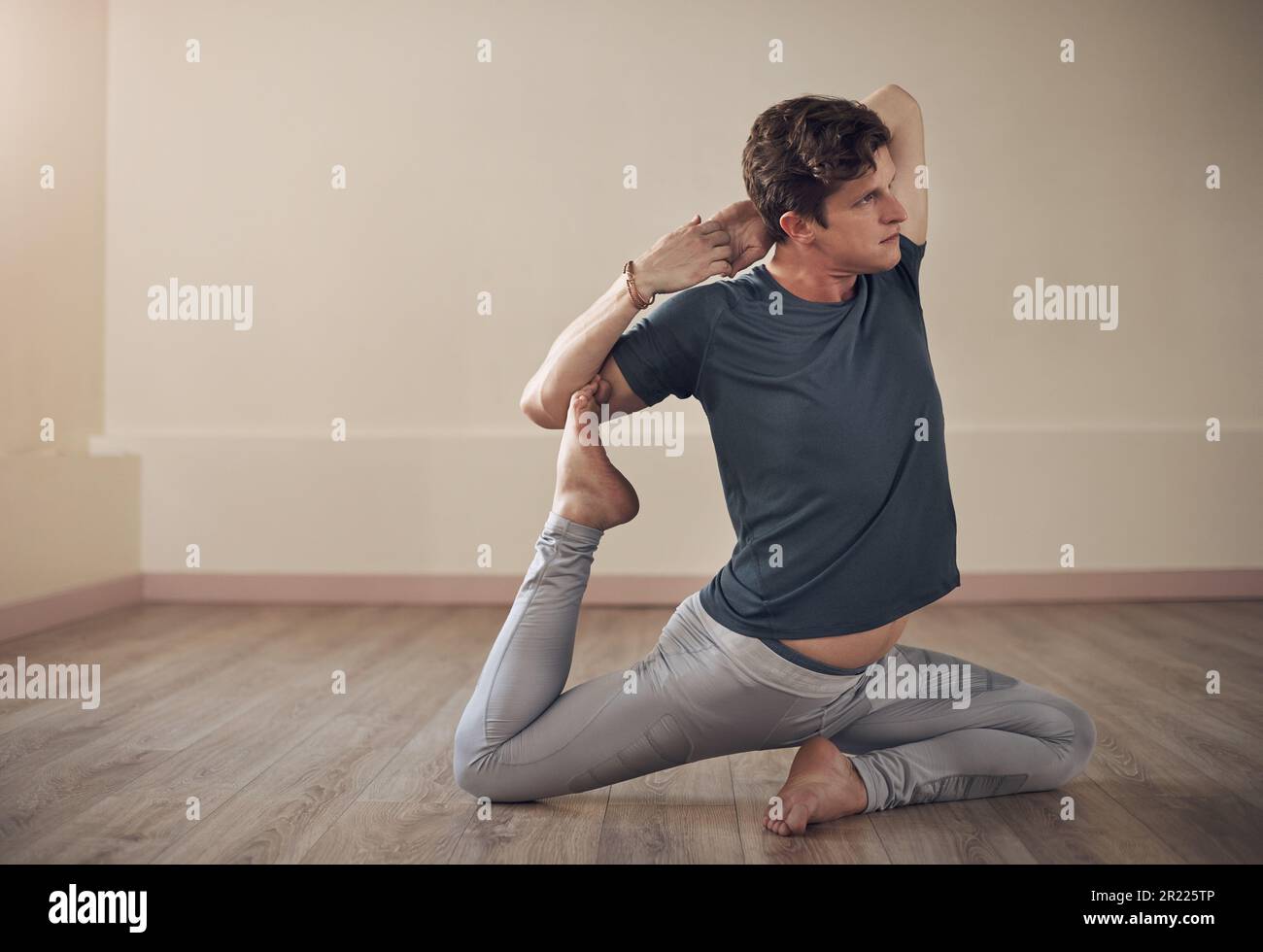 The body bends when the mind does. Full length shot of a handsome young ...