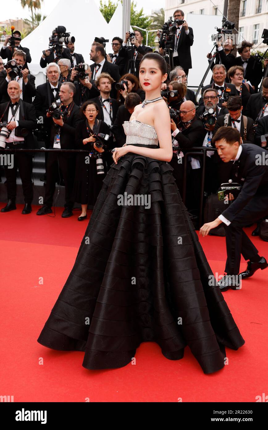 Guan Xiaotong poses for photographers upon arrival at the opening ...