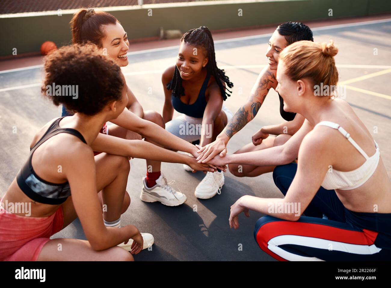 Lets Win This A Diverse Group Of Sportswomen Piling Their Hands