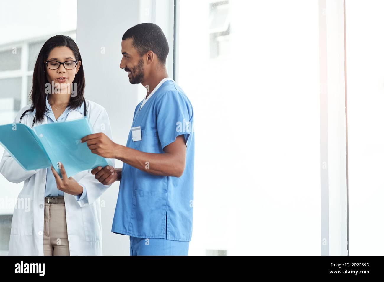 What do you make of this. two young doctors discussing the contents of ...