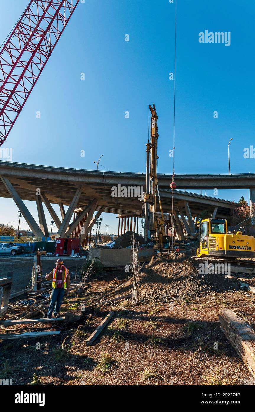 A drilling rig for digging drilled shafts to support freeway on-ramps ...