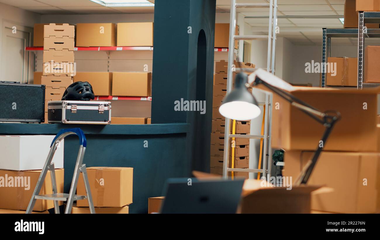 Empty storehouse space with cardboard boxes on shelves and racks Stock ...
