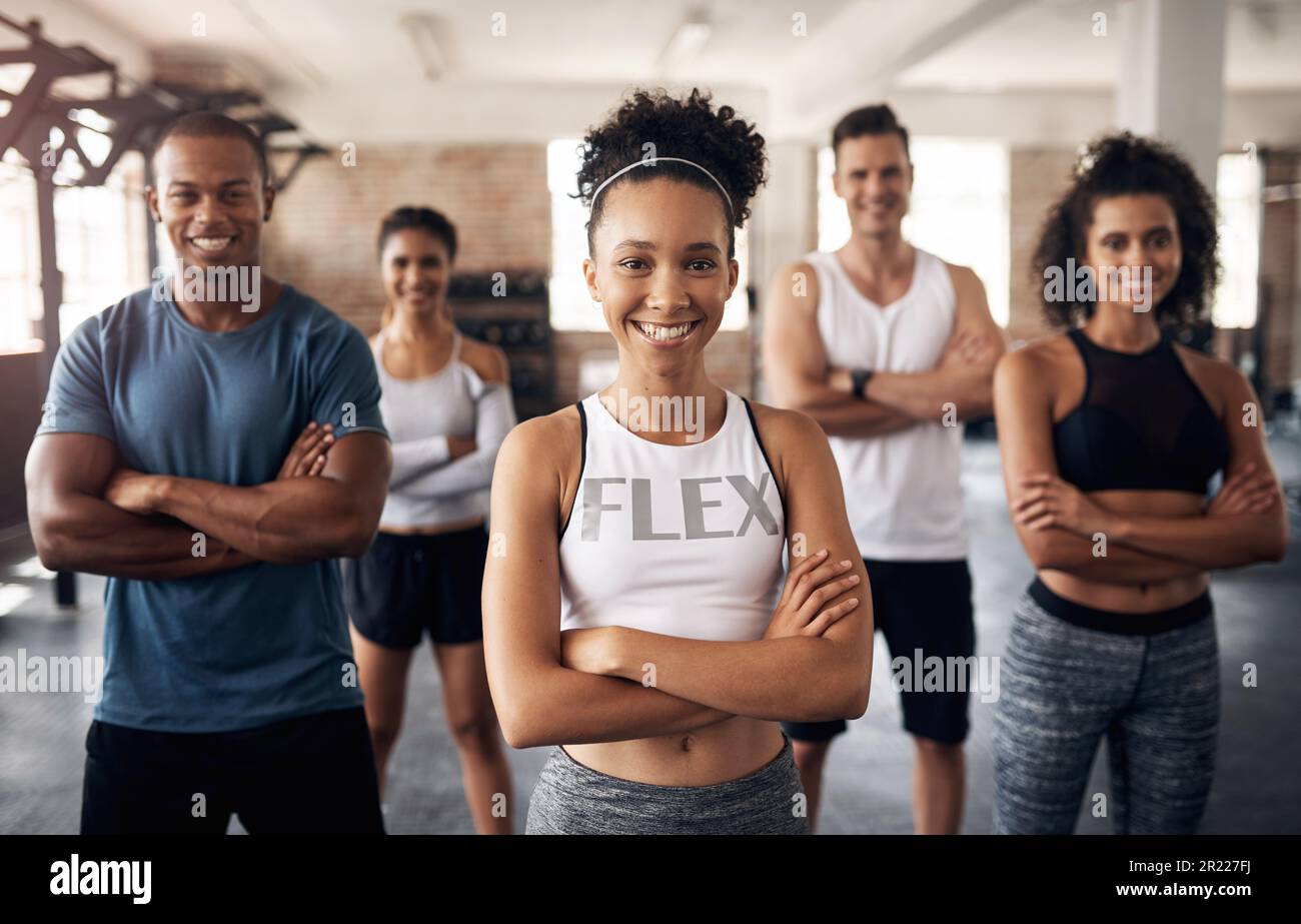 Just call us the get fit squad. Portrait of a group of confident young ...