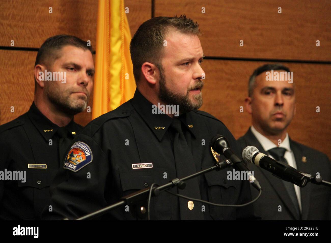 Farmington Deputy Police Chief Kyle Dowdy, center, provides details ...