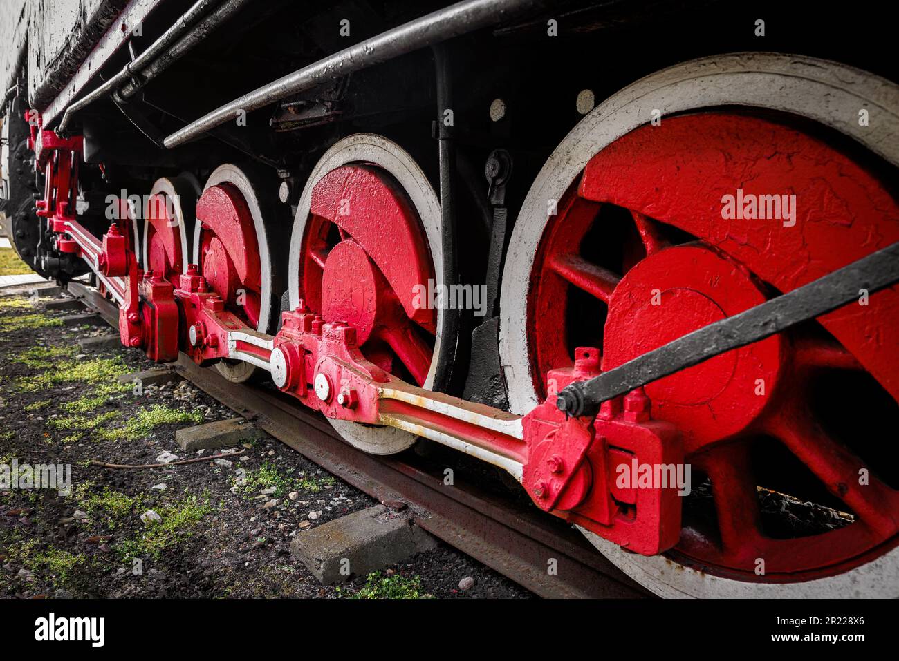 Red metal wheels of a vintage steam locomotive Stock Photo - Alamy