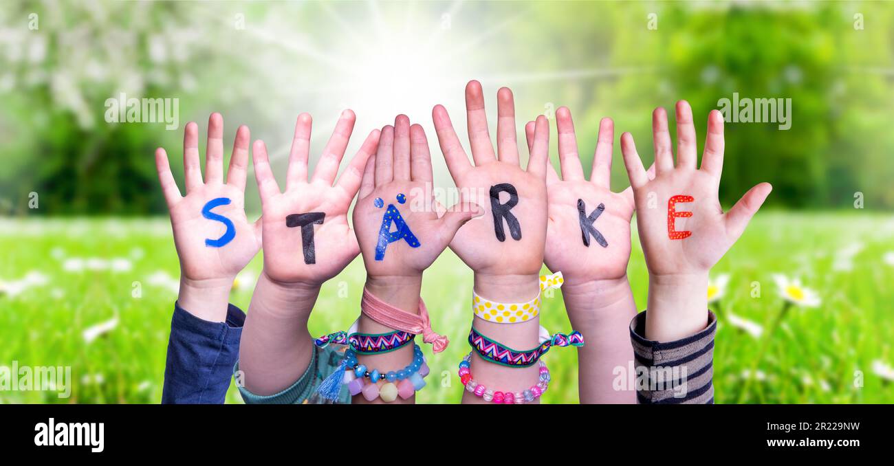 Children Hands Building Word Staerke Means Strength, Grass Meadow Stock ...