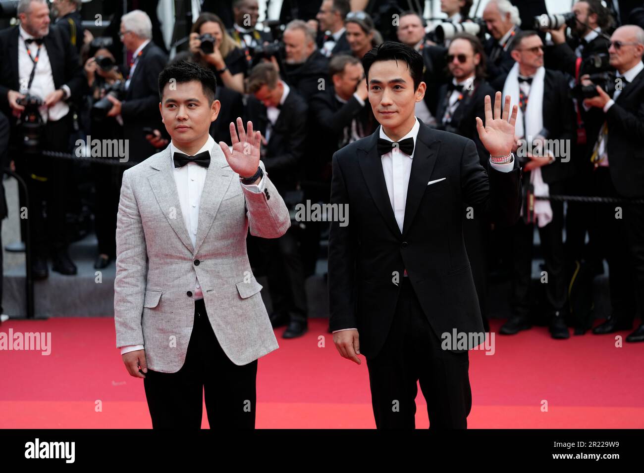 Wei Shujun, left, and Zhu Yilong pose for photographers upon arrival at ...