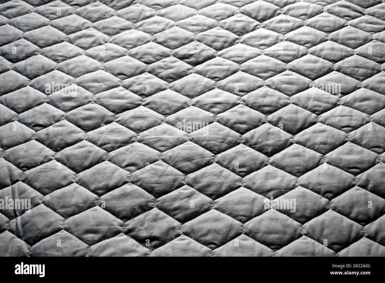 Duvet cover texture with matelasse on bed Stock Photo - Alamy