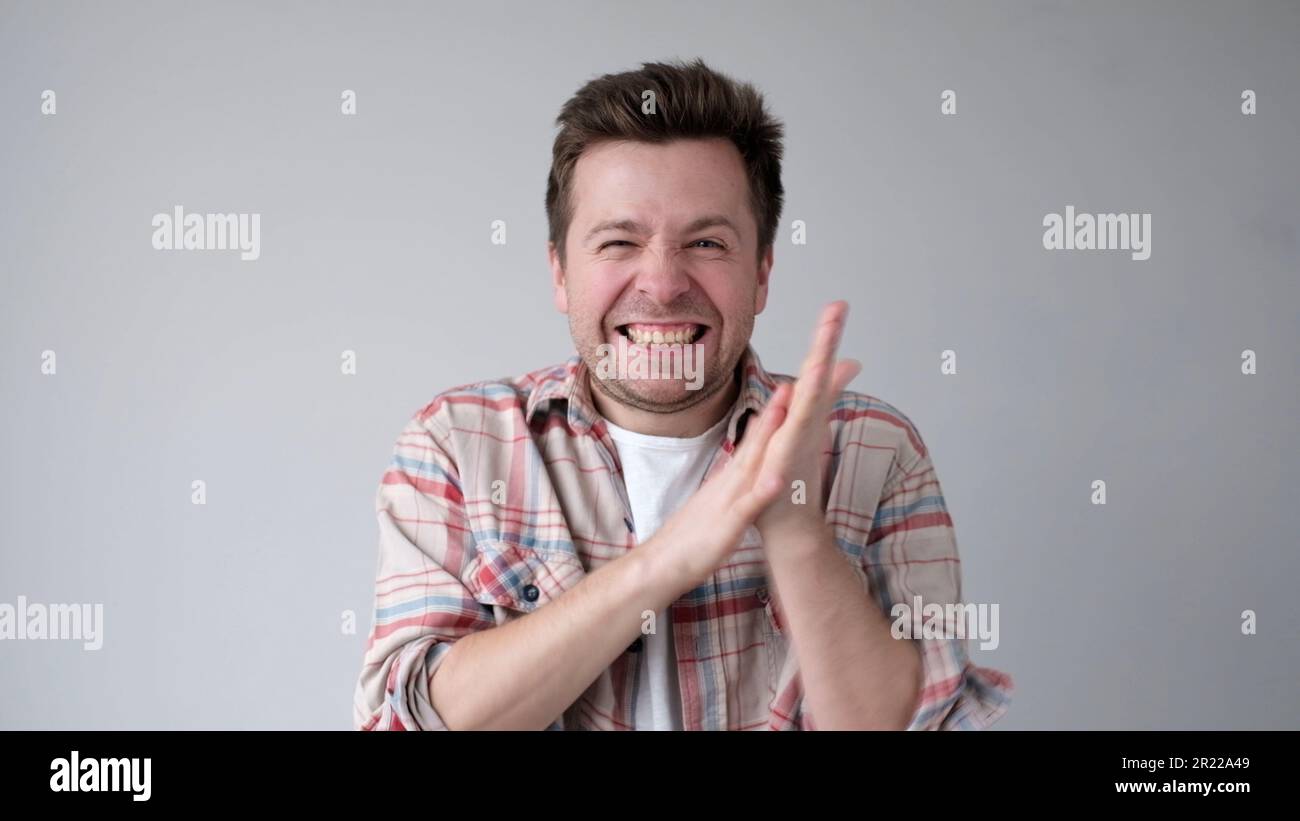 Happy young man hands hi-res stock photography and images - Alamy