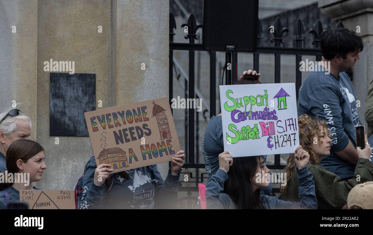 A group of people protesting for social equity and affordable housing ...
