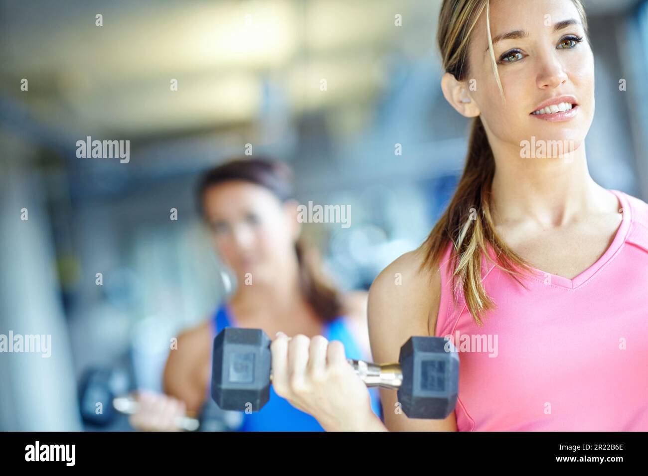 Im making great progress. A beautiful young woman working out at the ...
