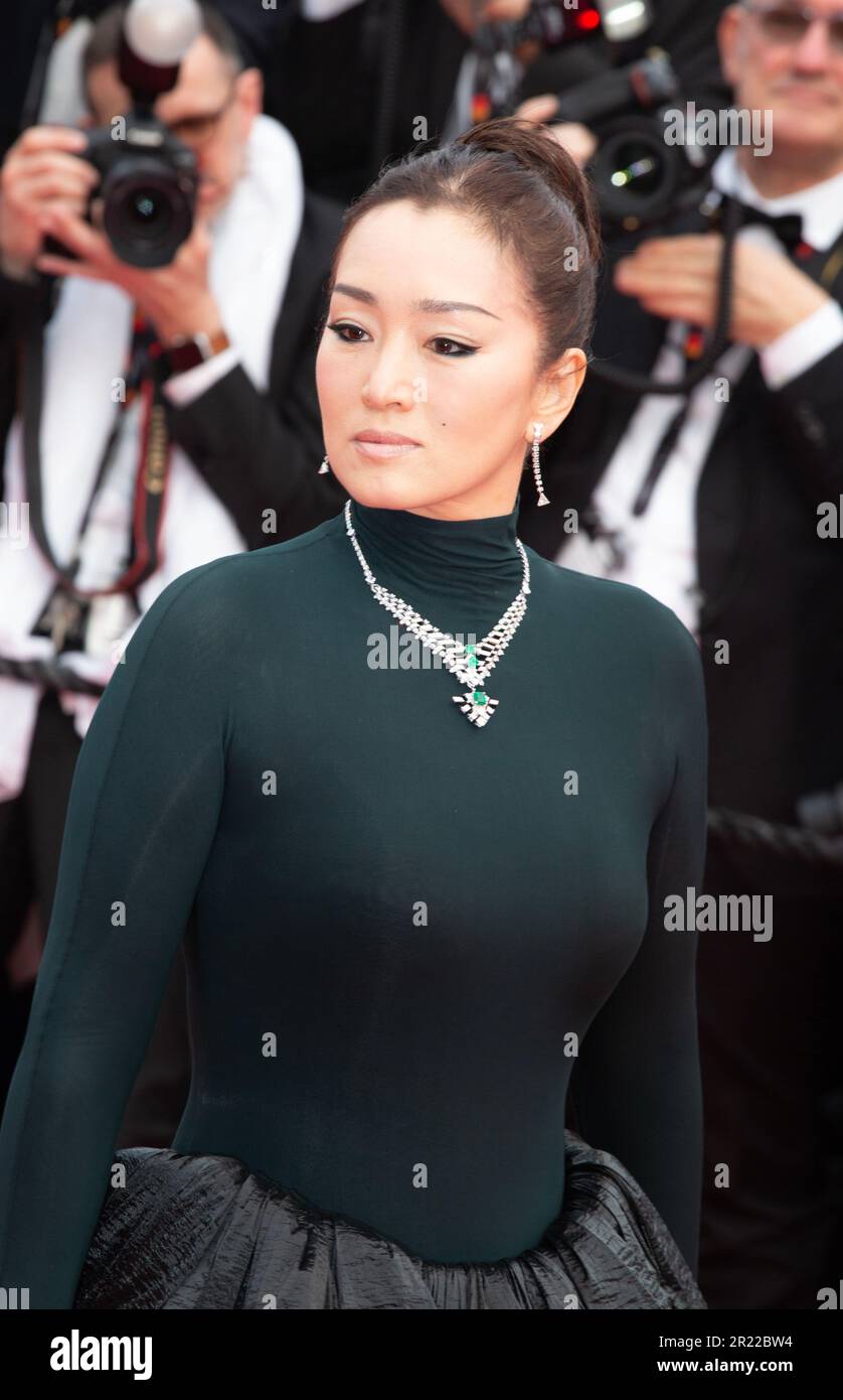 Cannes, France, 16th May, 2023. Gong Li on the red carpet at the opening ceremony and Jeanne du ...