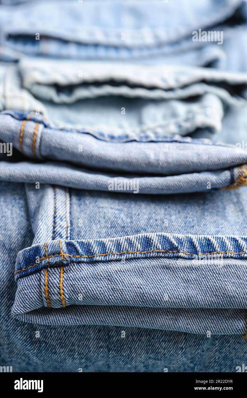 Different stylish rolled jeans, closeup Stock Photo - Alamy