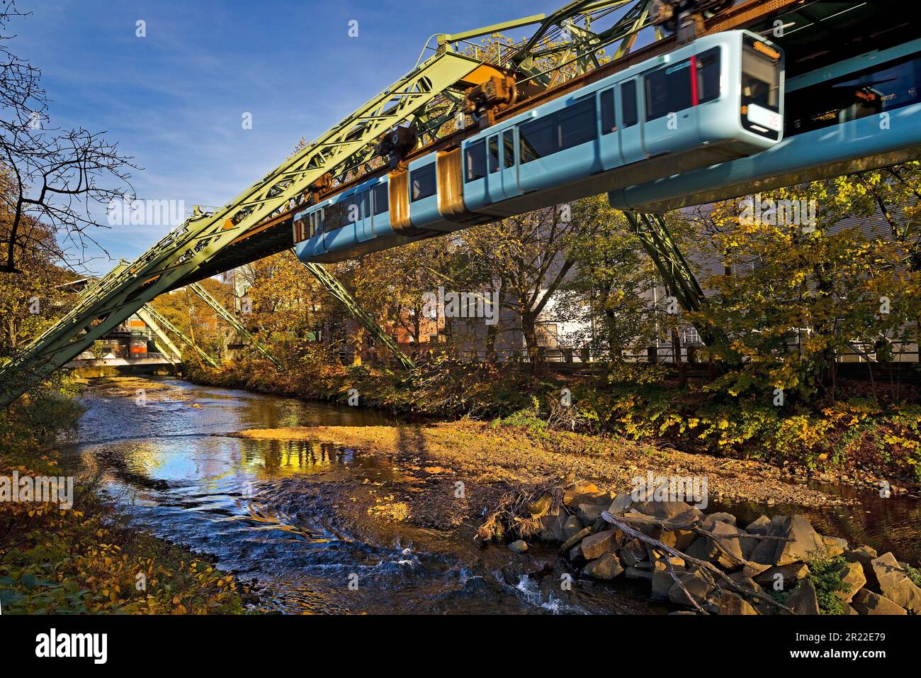 Wuppertaler Schwebebahn, two cars over the river Wupper, Germany, North ...