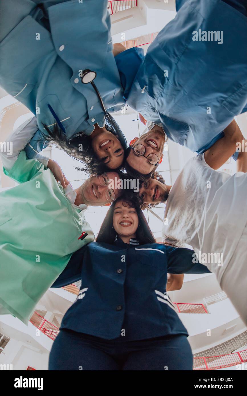 Group of doctors a medical nurse, and a surgeon are captured in a ...