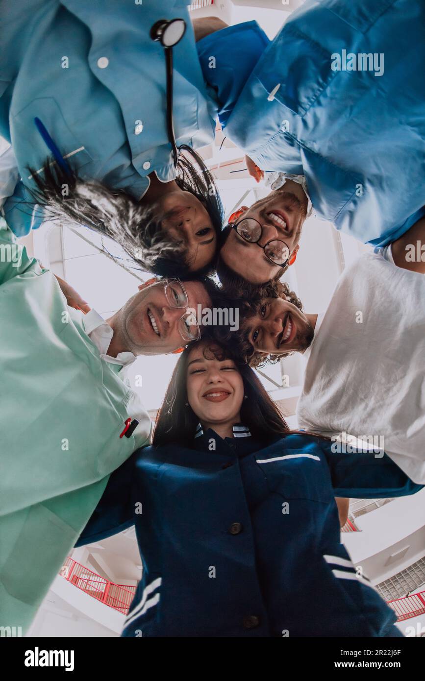 Group of doctors a medical nurse, and a surgeon are captured in a ...