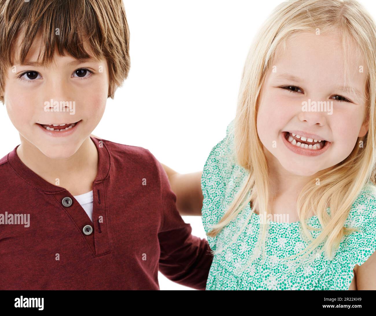 We go everywhere together. Studio shot of a cute little boy and girl posing together against a ...