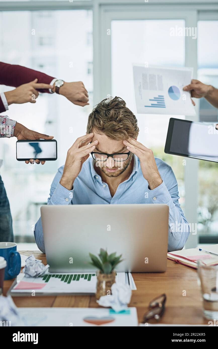 When there are more tasks than hours in a day. a young businessman ...