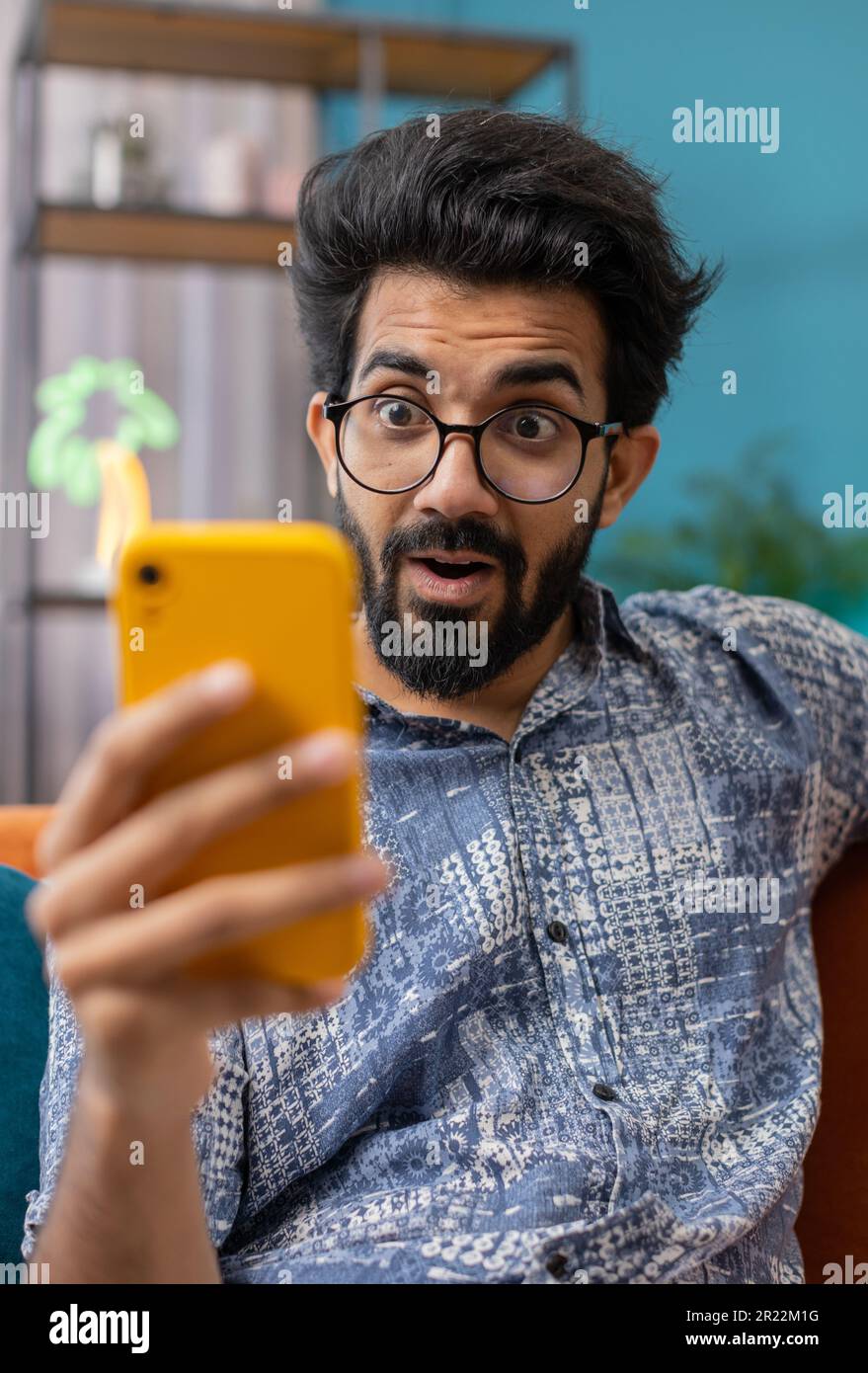 Oh My God Wow Excited Happy Indian Man Use Smartphone Typing Browsing