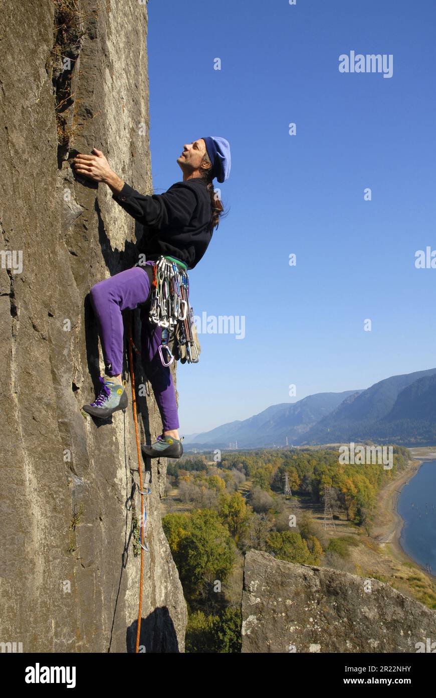 Male rock climber ascends Beacon rock in southern Washington state ...