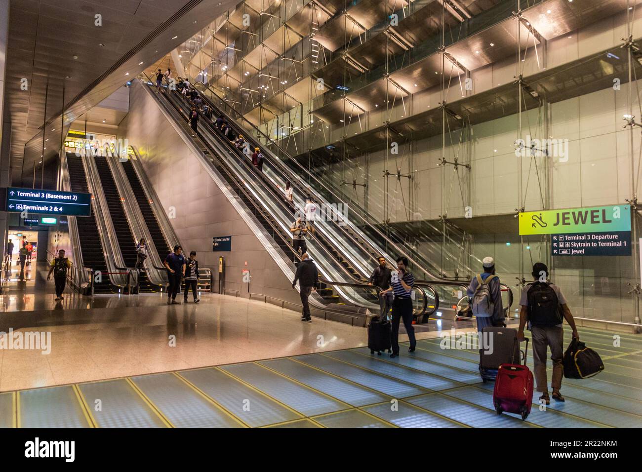 SINGAPORE, SINGAPORE - DECEMBER 17, 2019: Escalators at the Changi ...