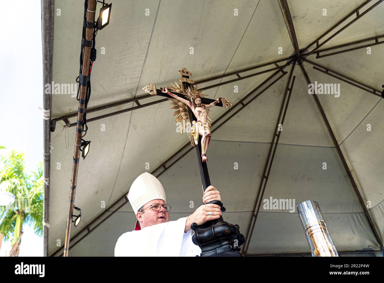 Salvador, Bahia, Brazil - January 06, 2023: Priest is holding the image ...