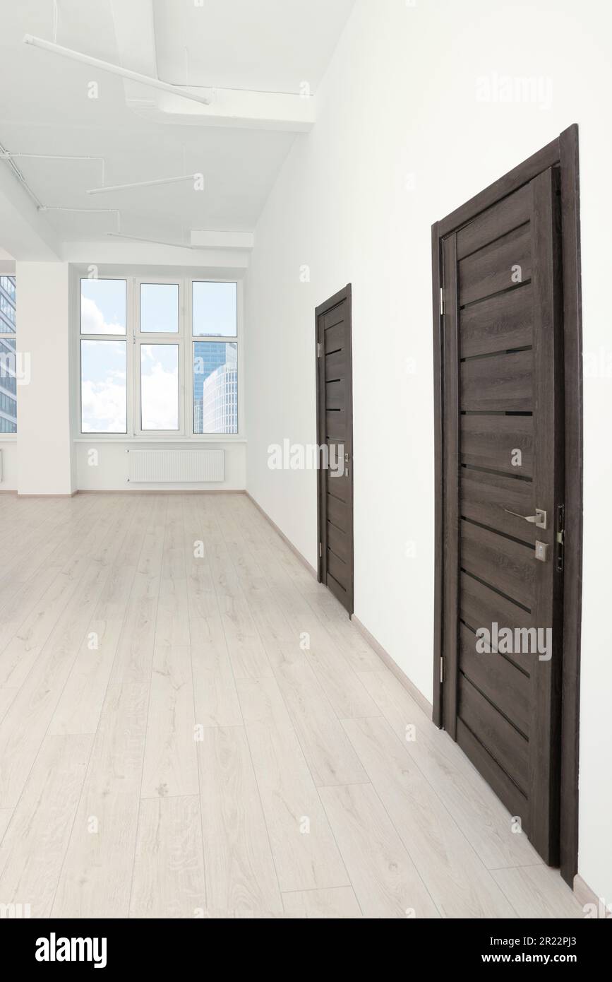 Modern office room with windows and doors. Interior design Stock Photo ...