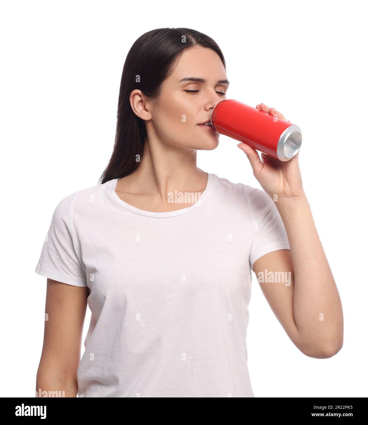Beautiful young woman drinking from tin can on white background Stock ...