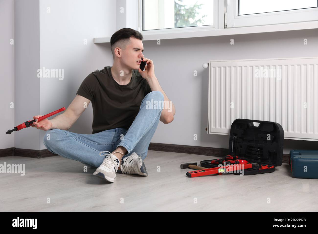 Upset handyman hi-res stock photography and images - Alamy