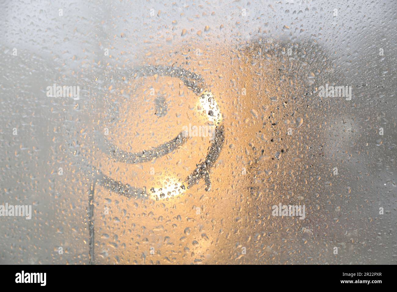 Happy face drawn on foggy window, space for text. Rainy weather Stock ...