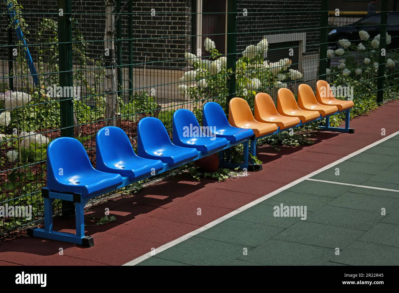 Empty chairs on outdoor children's playground in residential area Stock ...