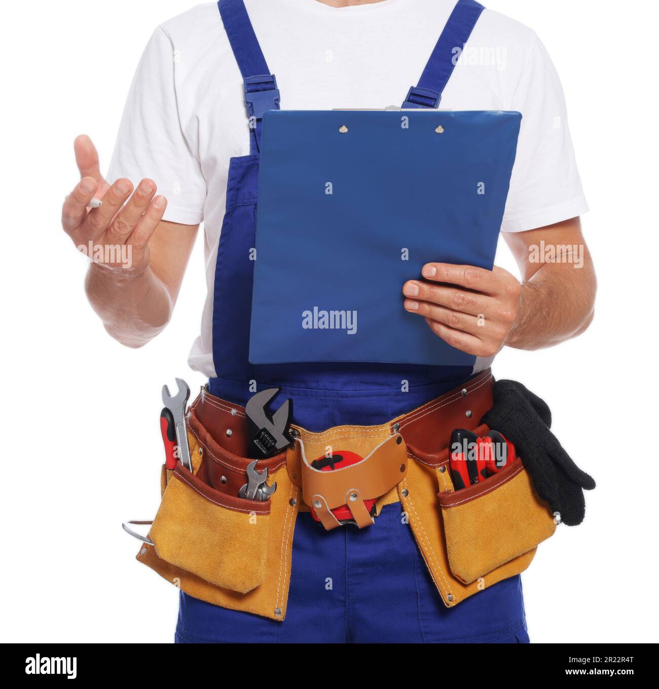 Professional plumber with clipboard and tool belt on white background ...