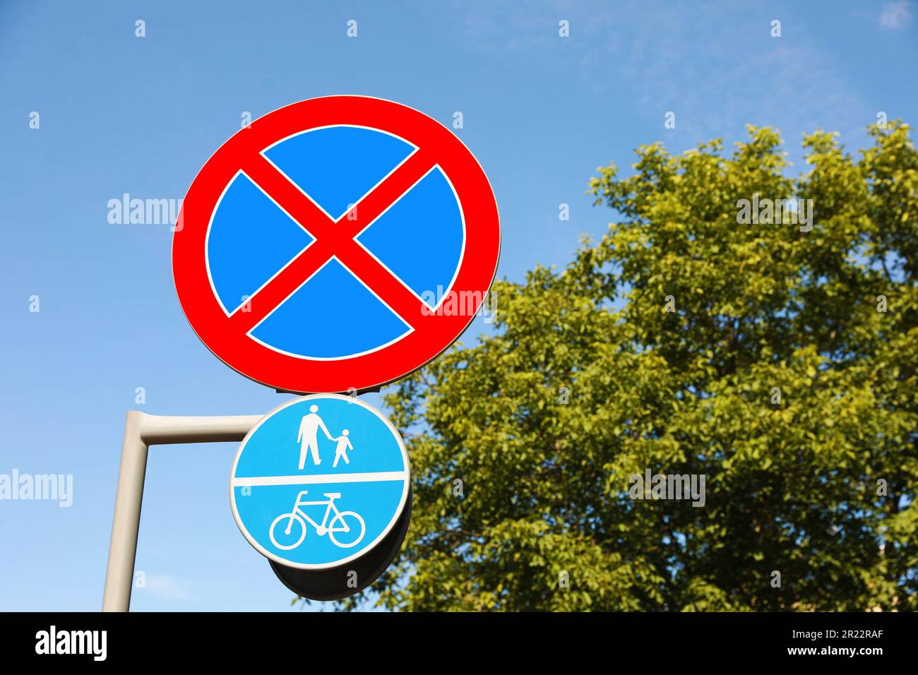 Post with different road signs outdoors. Space for text Stock Photo - Alamy