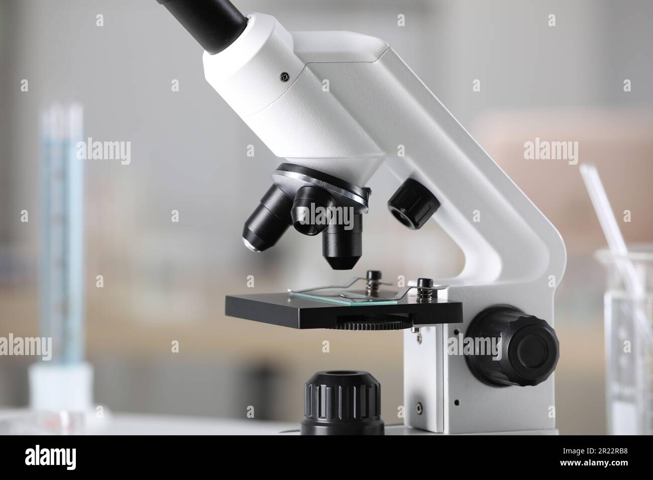 Microscope on blurred background hi-res stock photography and images ...