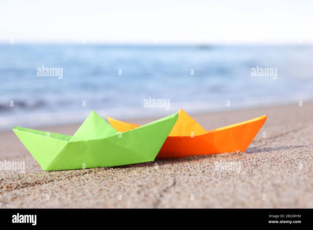Light green paper boats hi-res stock photography and images - Alamy