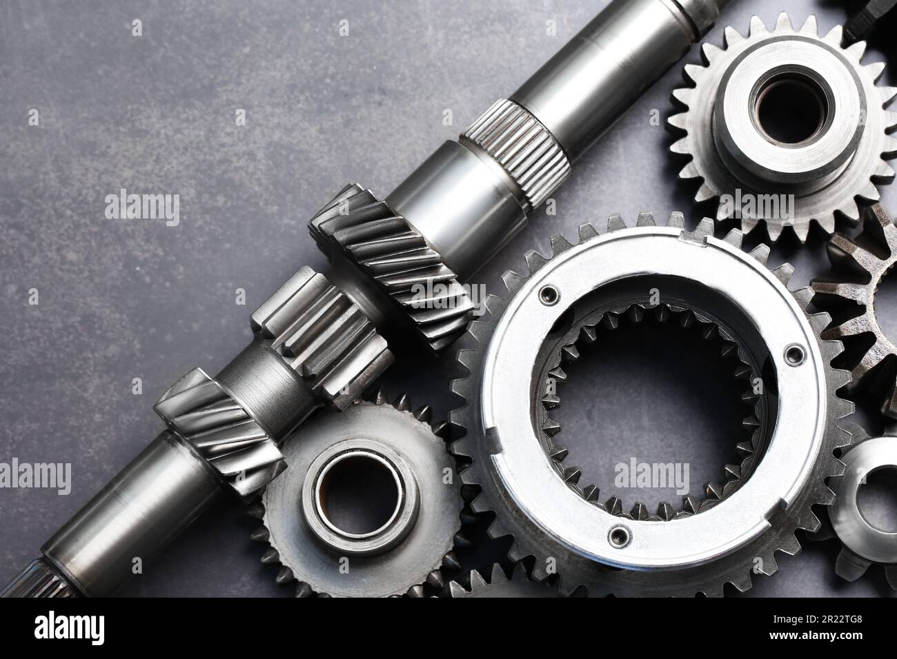 Different stainless steel gears on grey background, flat lay Stock ...