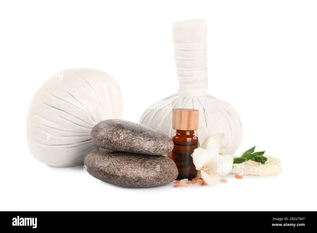 Herbal massage bags and other spa products on white background Stock ...