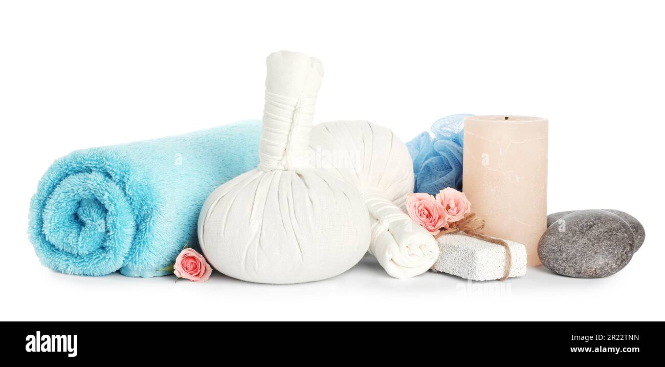 Herbal massage bags and other spa products on white background Stock ...
