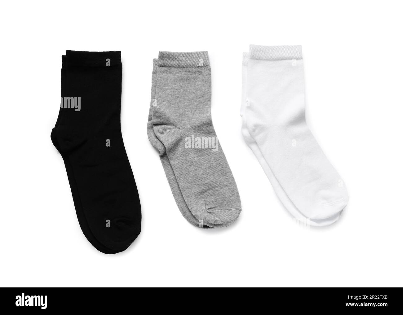 Different pairs of socks isolated on white, top view Stock Photo - Alamy