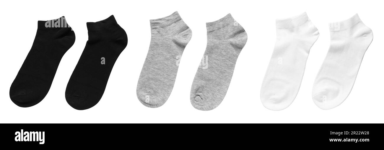 Set with different socks on white background. Banner design Stock Photo ...