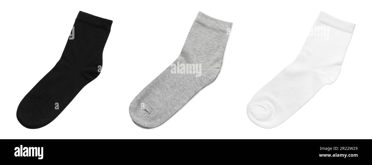 Set with different socks on white background. Banner design Stock Photo ...