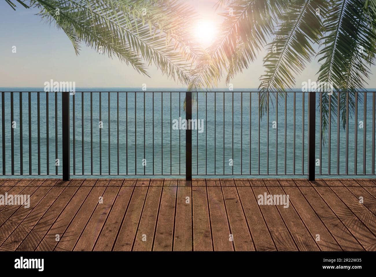 Outdoor wooden terrace under palm trees revealing picturesque view on ...
