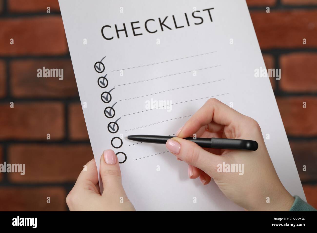 Woman filling audit checklist hi-res stock photography and images - Alamy