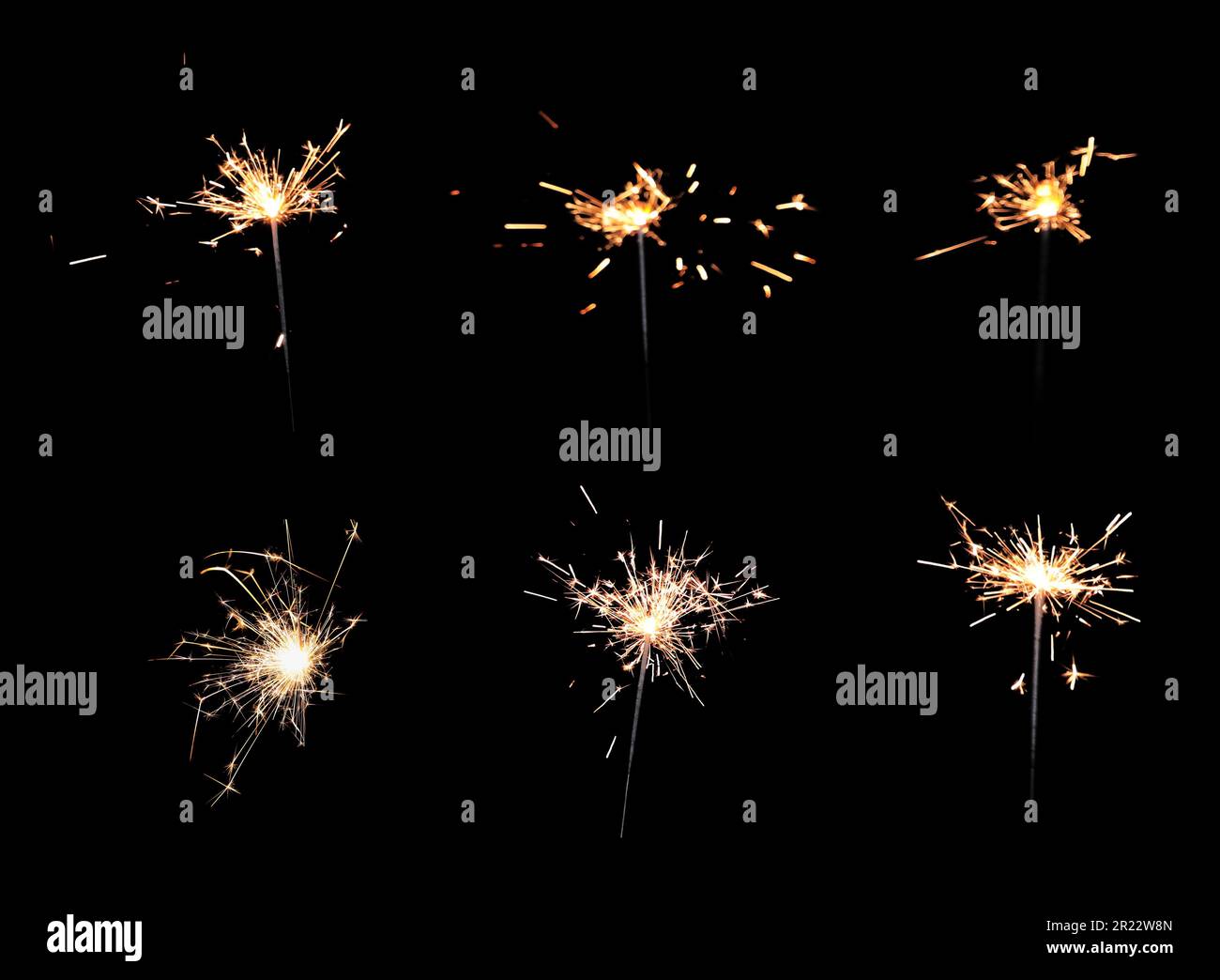 Collage with bright burning sparklers on black background Stock Photo ...